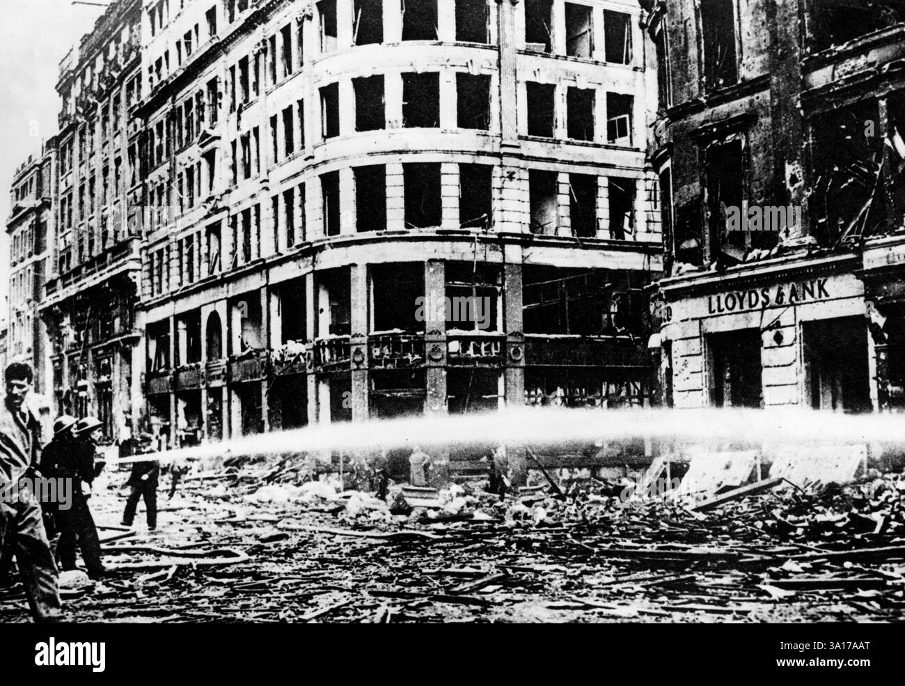 Fire department extinguishing fires after an air raid. [automated ...