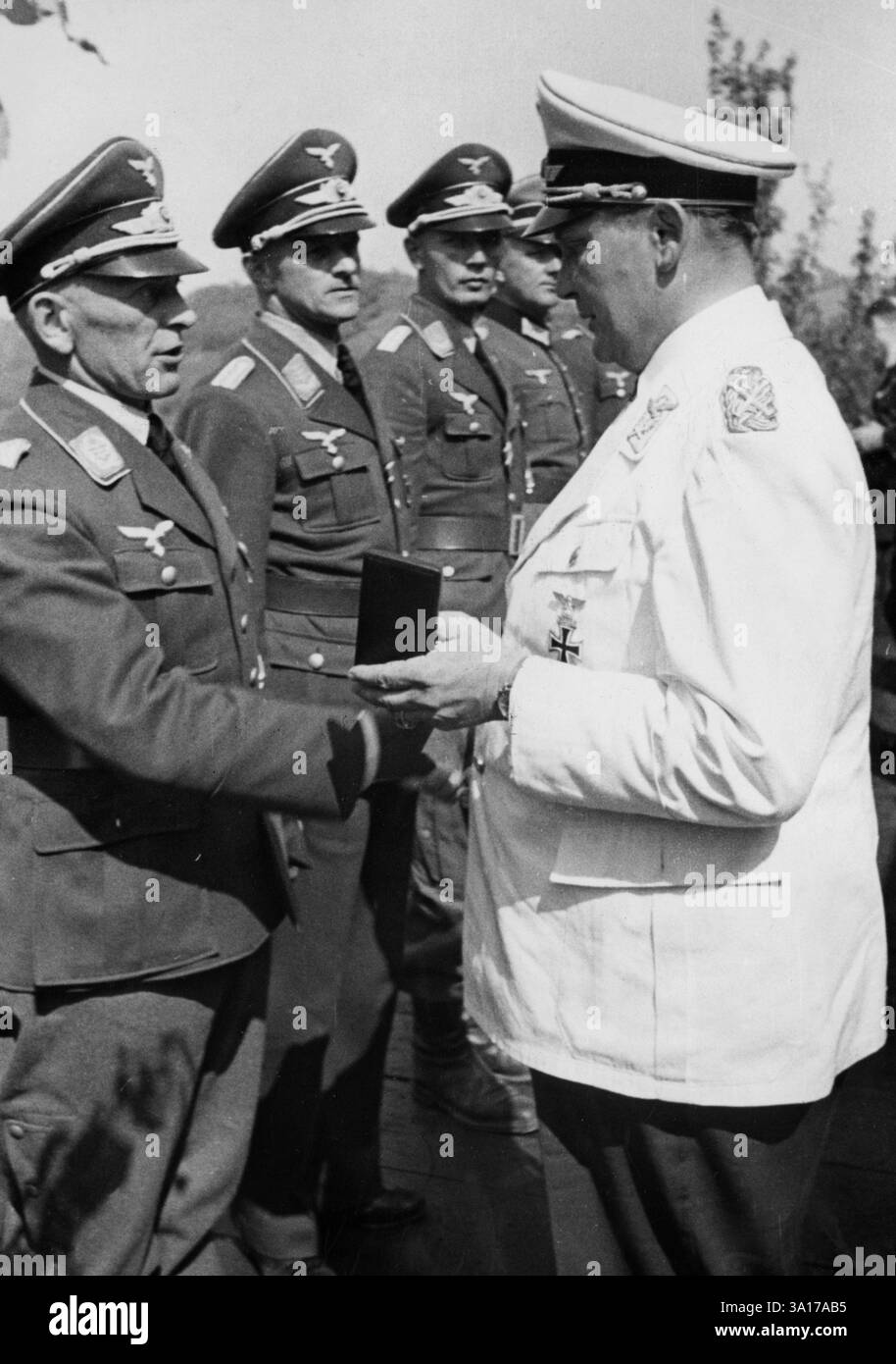 Hermann Göring, Commander-in-Chief of the Luftwaffe, awards the Knight ...