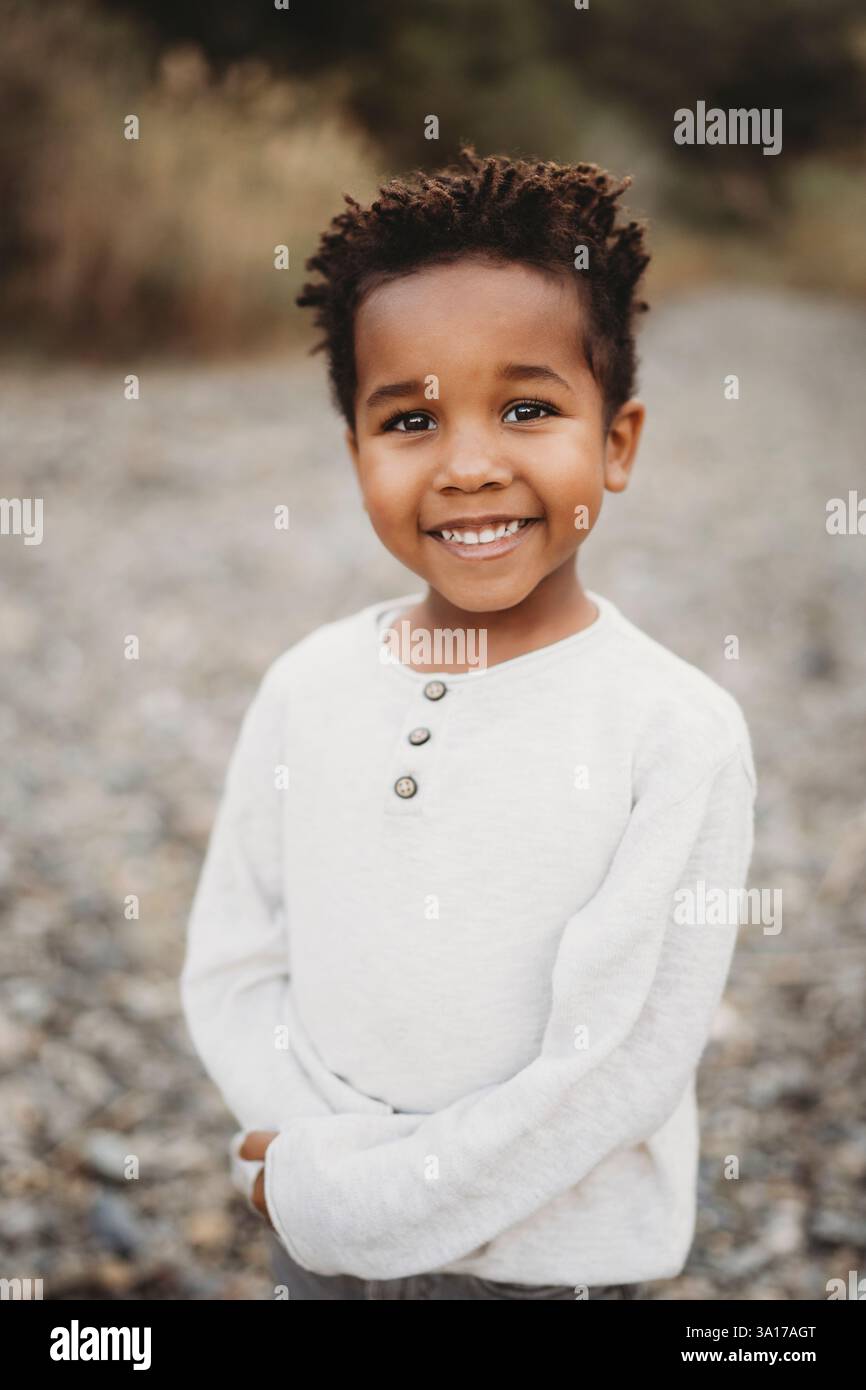 Portrait beautiful black 5 year old boy smiling outside in sumer Stock ...