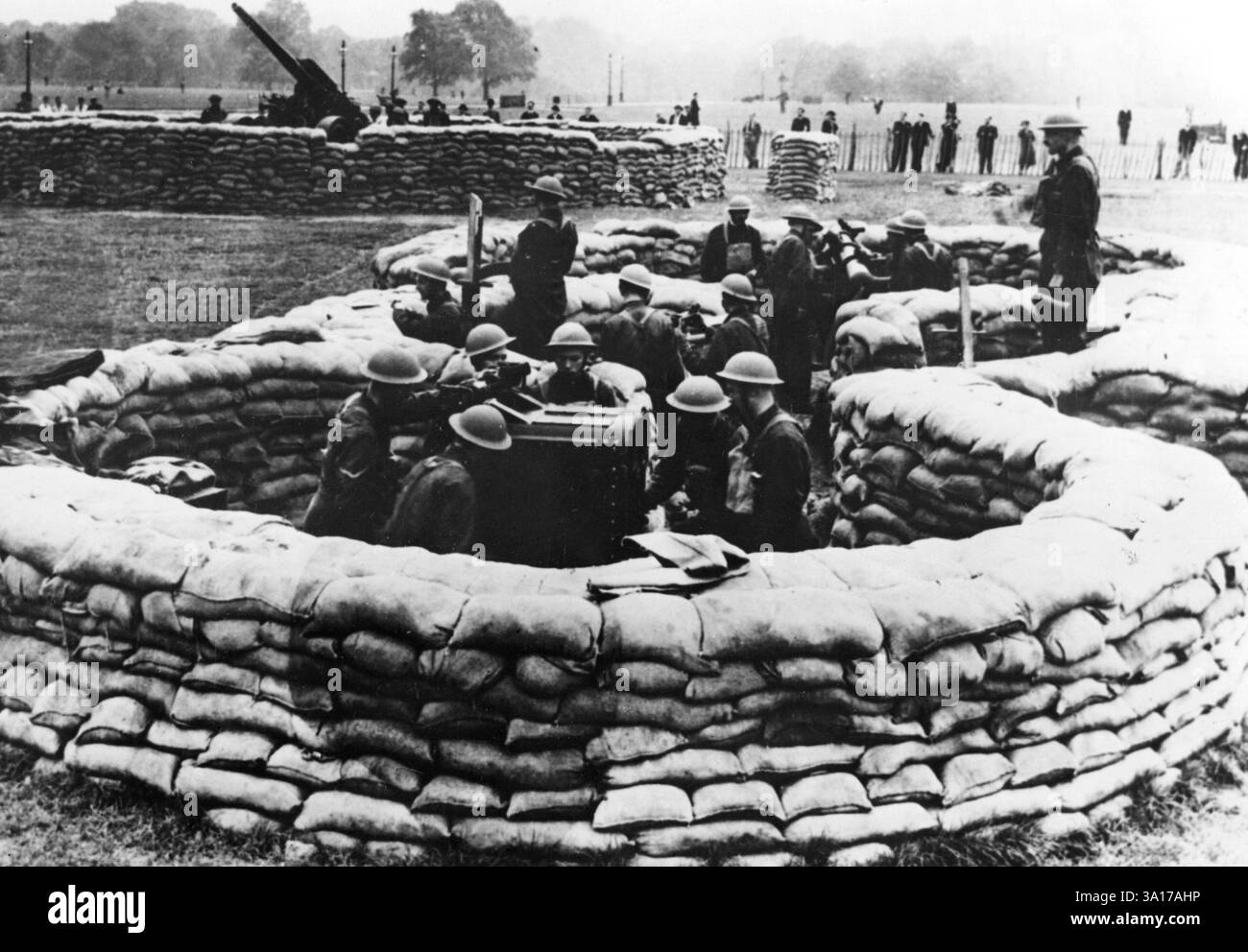 Anti-aircraft gun emplacement in a park in Lodon. In the foreground, a ...