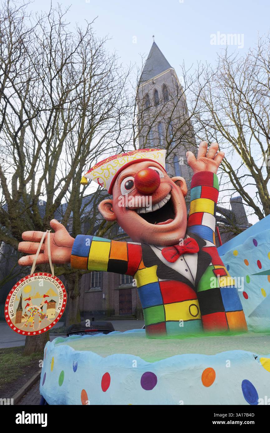 Colourfully dressed carnival figure with outstretched arms on a themed float, papier-mache, Rose ...