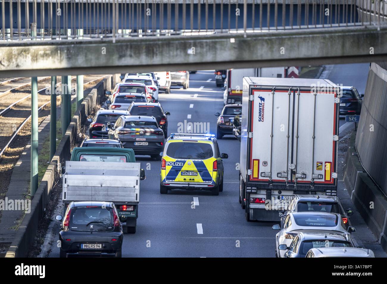 Traffic jam on the A40 motorway, emergency lane, vehicles on the left ...