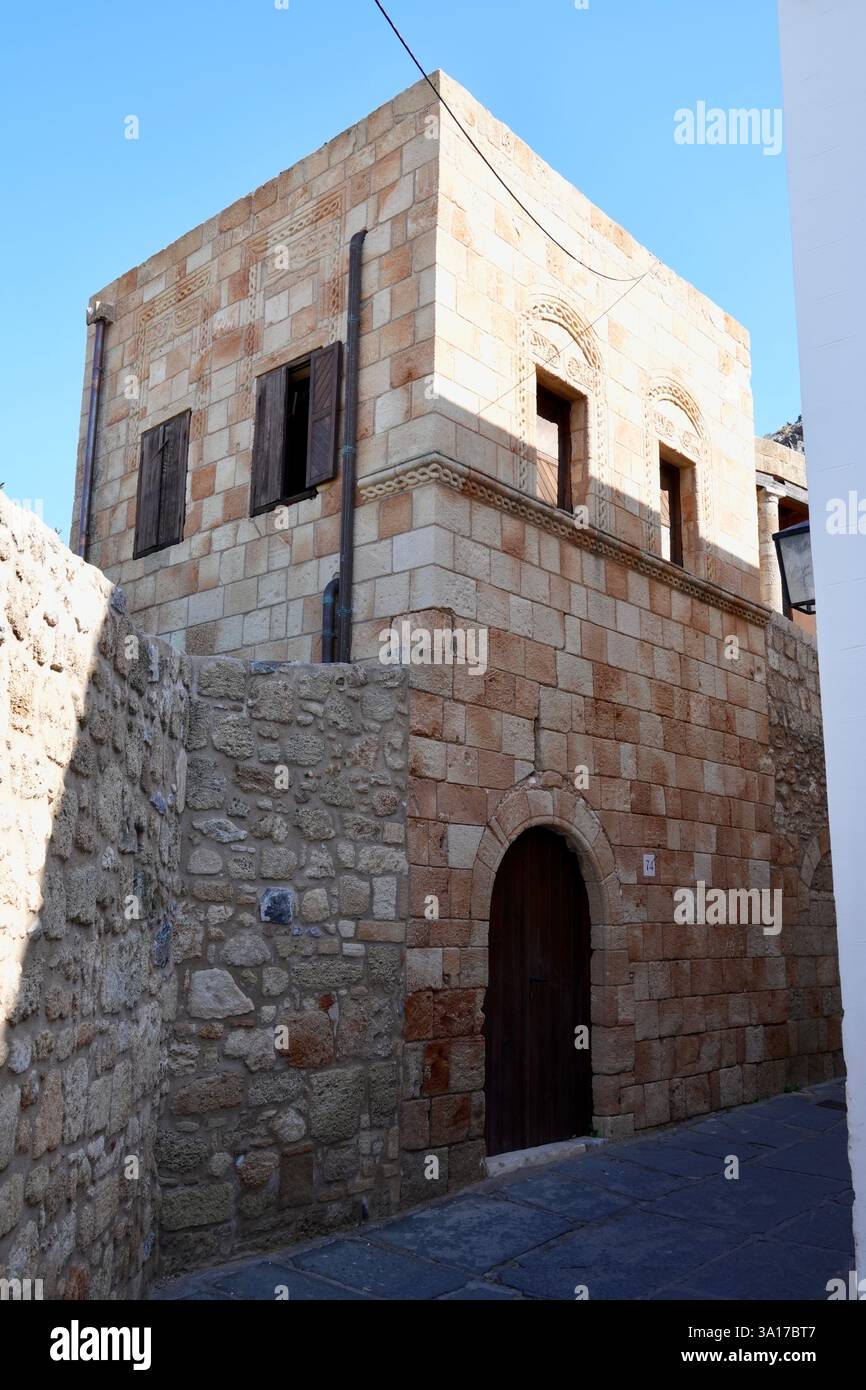 Ancient brown stone building in the village Stock Photo - Alamy