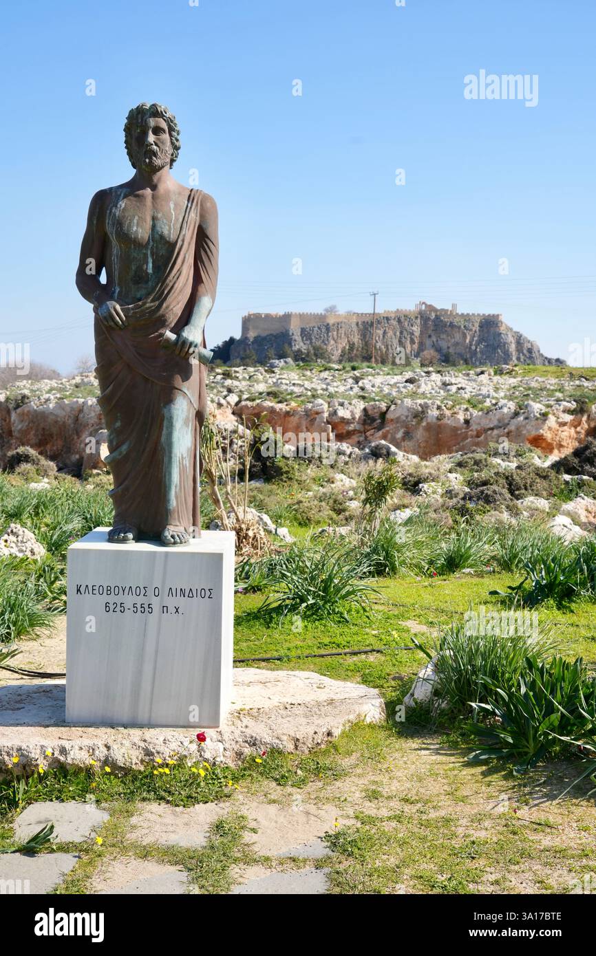 Statue of Cleobulus of Lindos with Lindos Acropolis behind Stock Photo ...