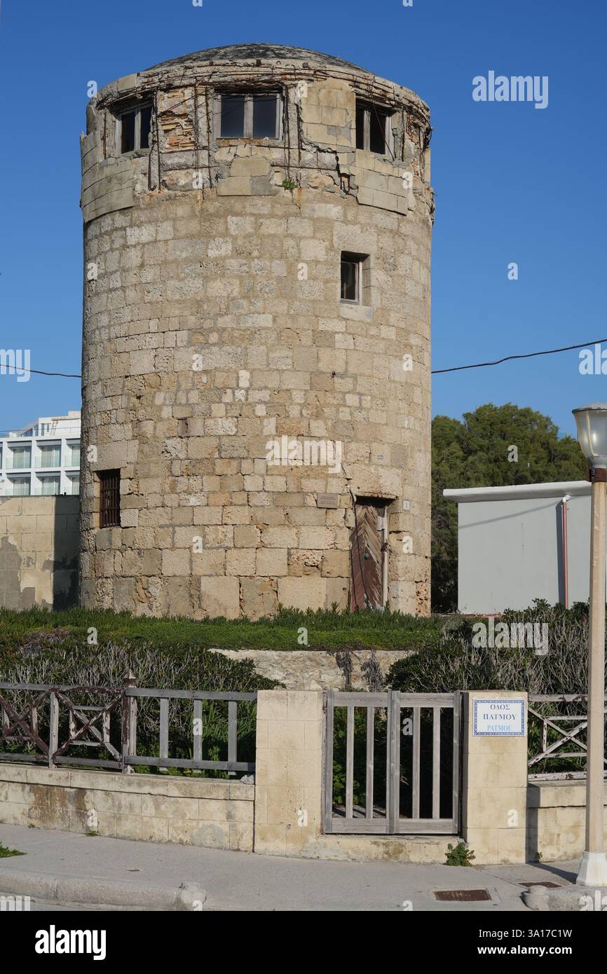 Medieval stone windmill tower under a blue sky Stock Photo - Alamy