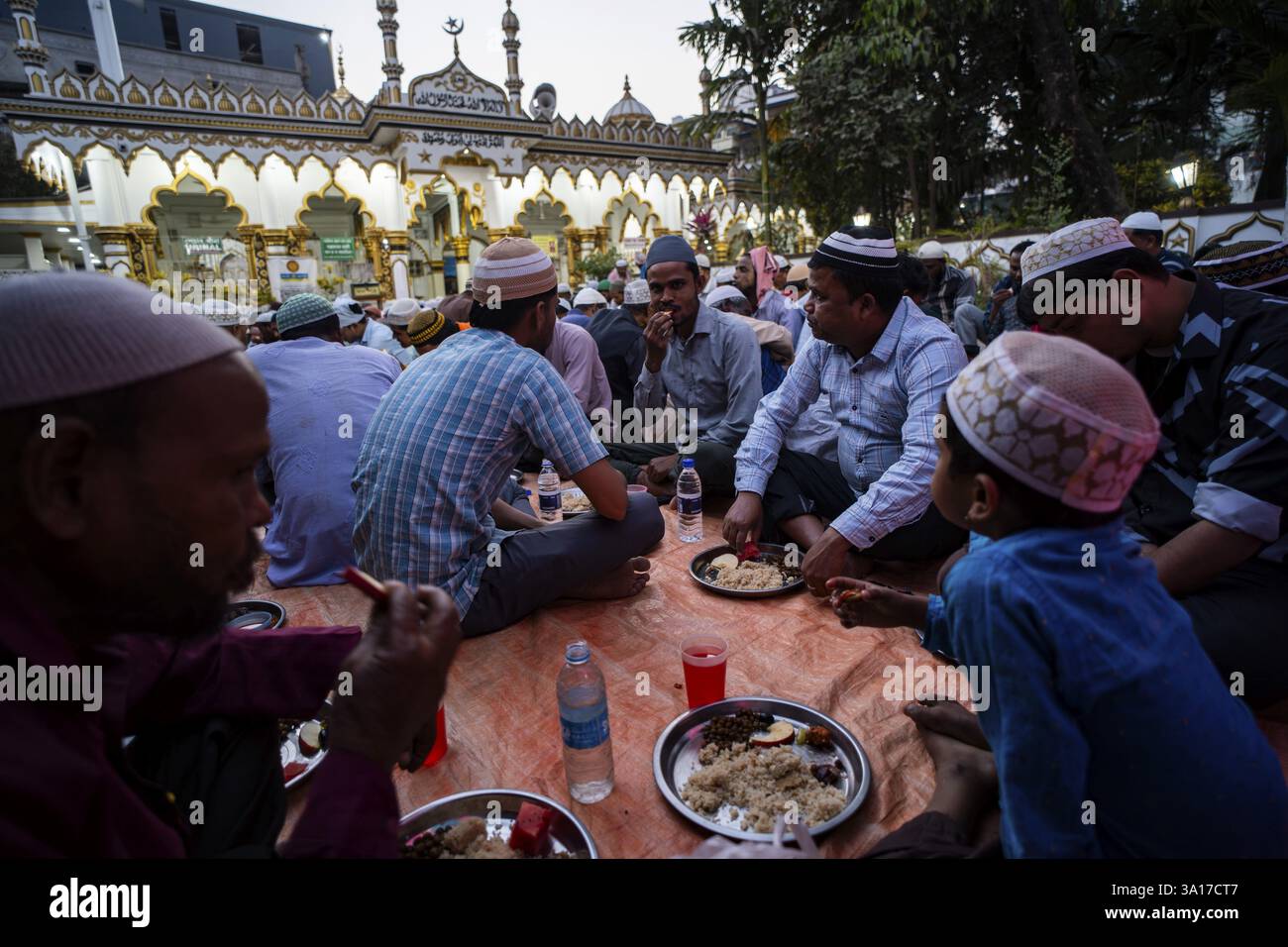 Muslims having Ramadan's Iftar at a amosque during Muslim holy month of ...