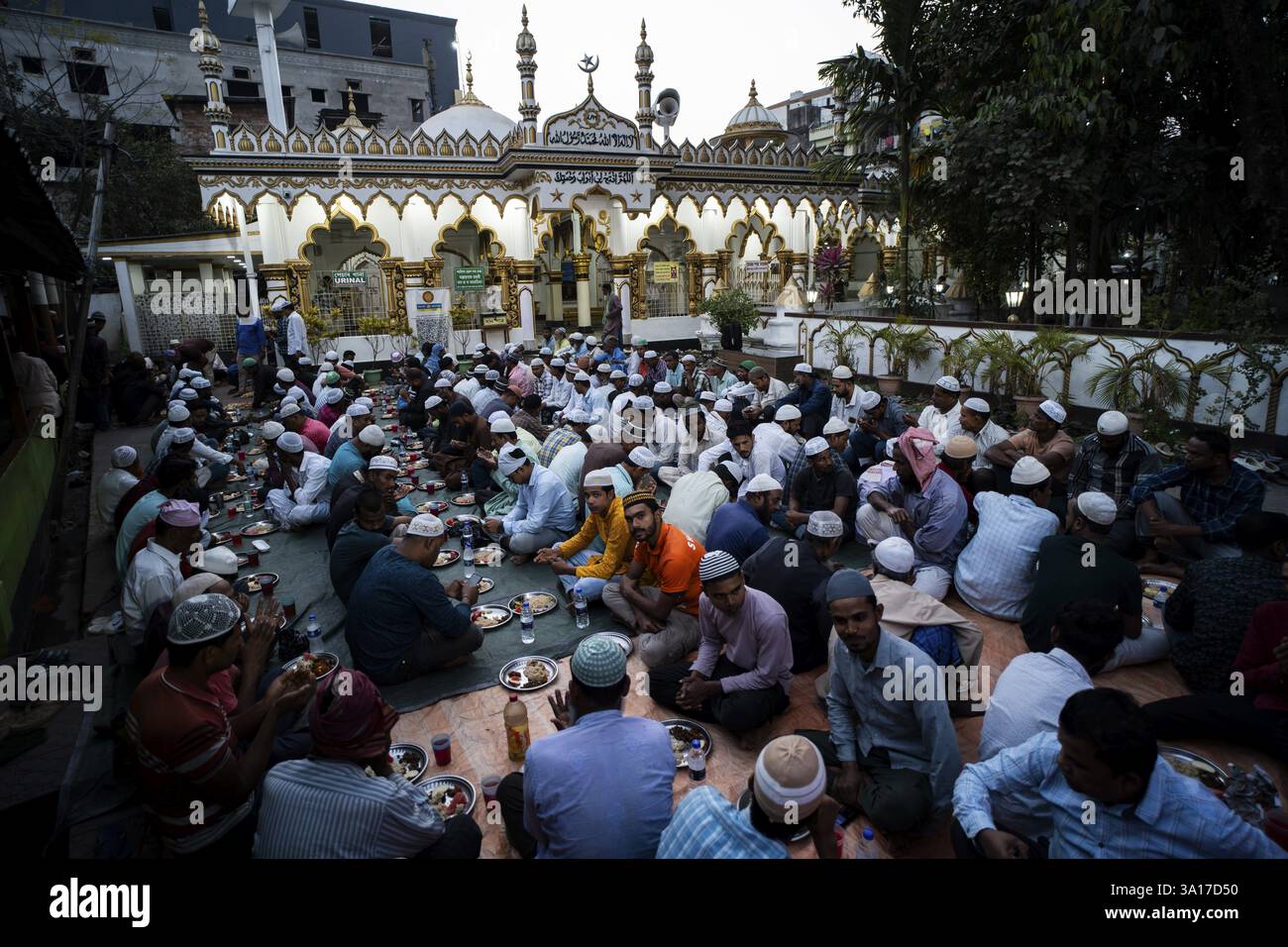 Muslims having Ramadan's Iftar at a amosque during Muslim holy month of ...