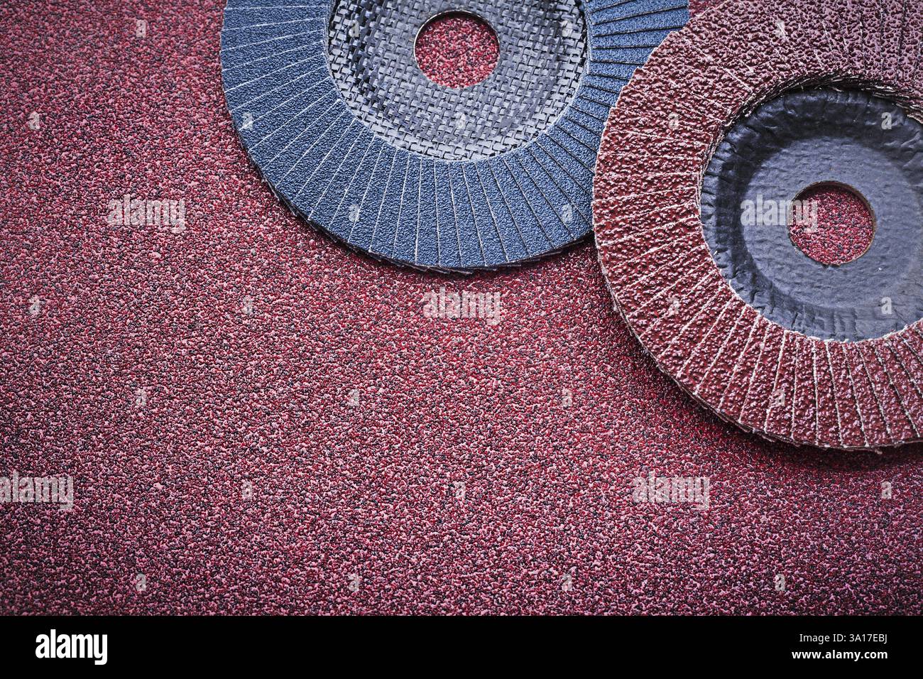 Flap grinding wheels on sandpaper directly above Stock Photo - Alamy