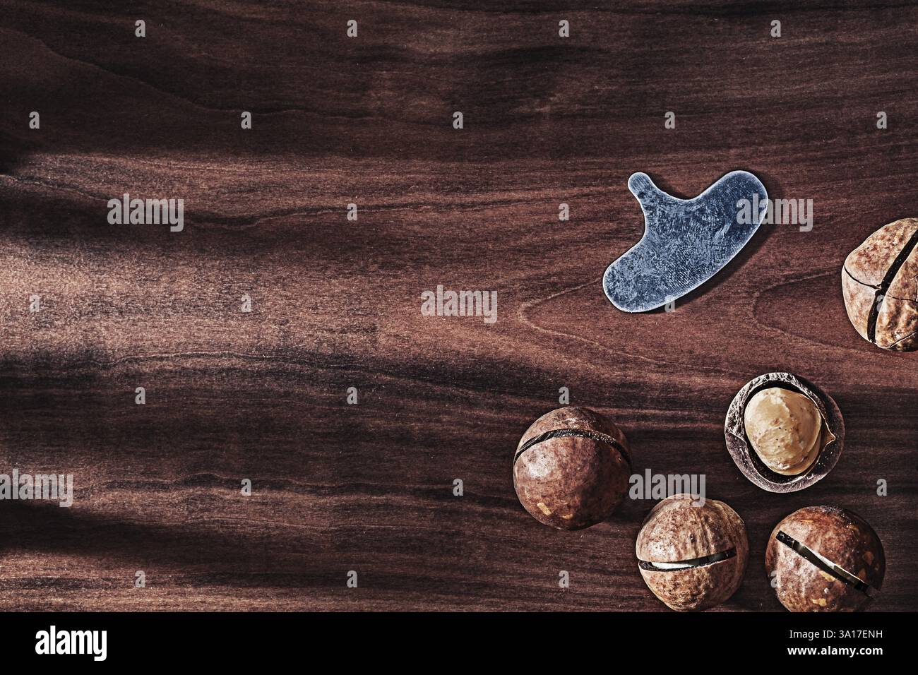 Nuts Of Macadamia On Vintage Wood With Copy Space Stock Photo - Alamy