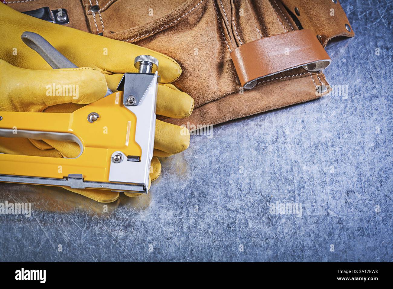 Collection of leather tool belt protective gloves construction stapler ...