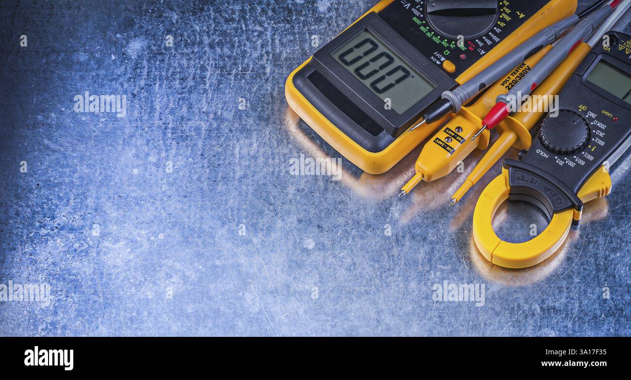Digital ammeter electric tester multimeter on metallic background Stock ...