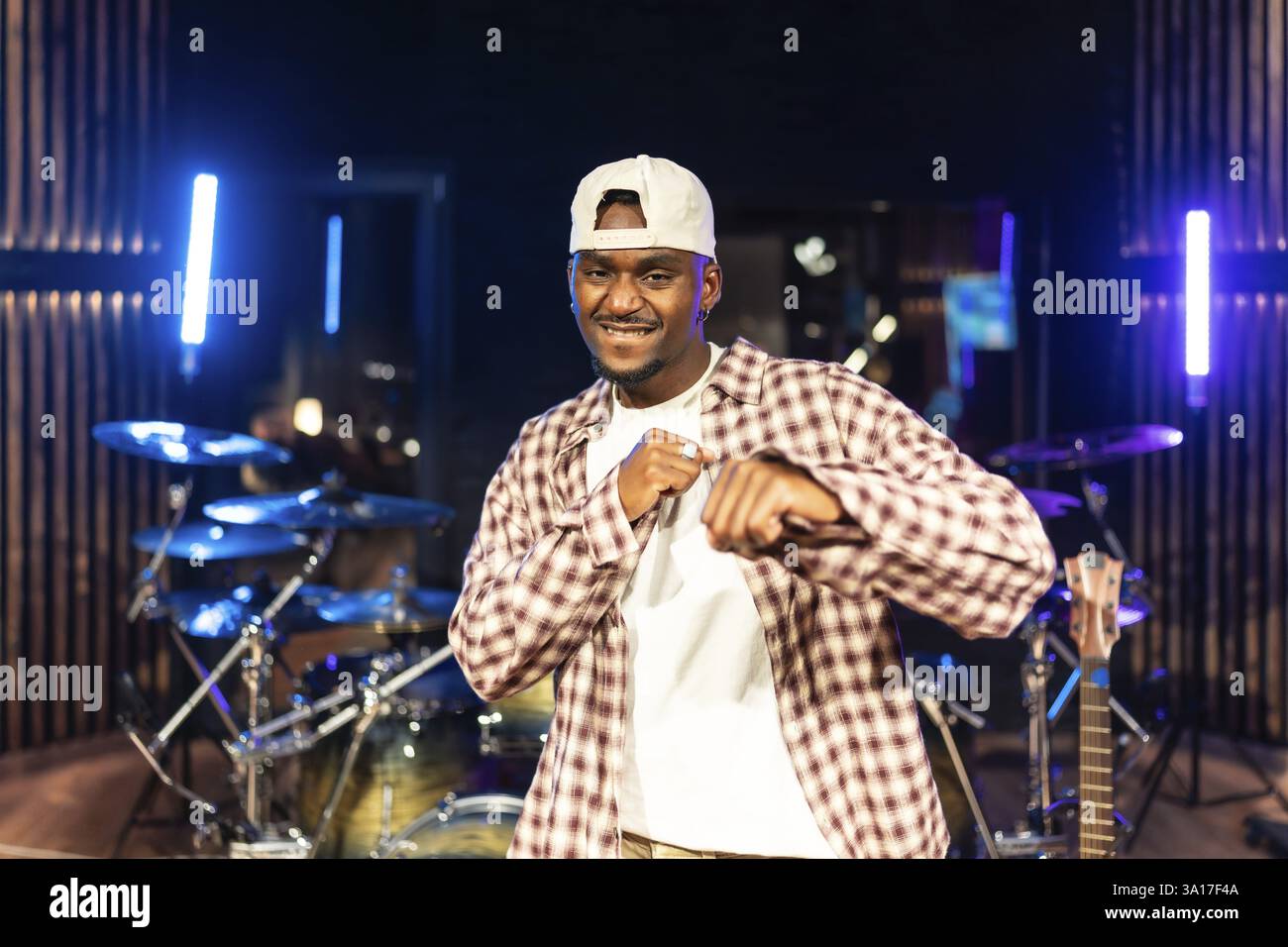 Young man energetically dances hi-res stock photography and images - Alamy