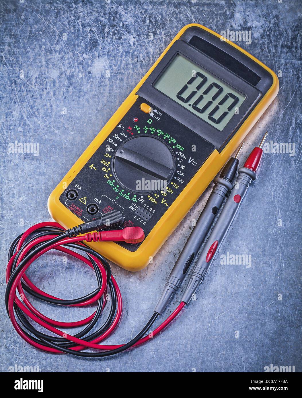 Digital electrical tester on metallic background Stock Photo - Alamy