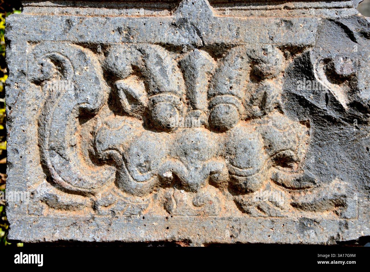 Carved stone artifacts displayed near the Solah Khamba Masjid, Fort ...