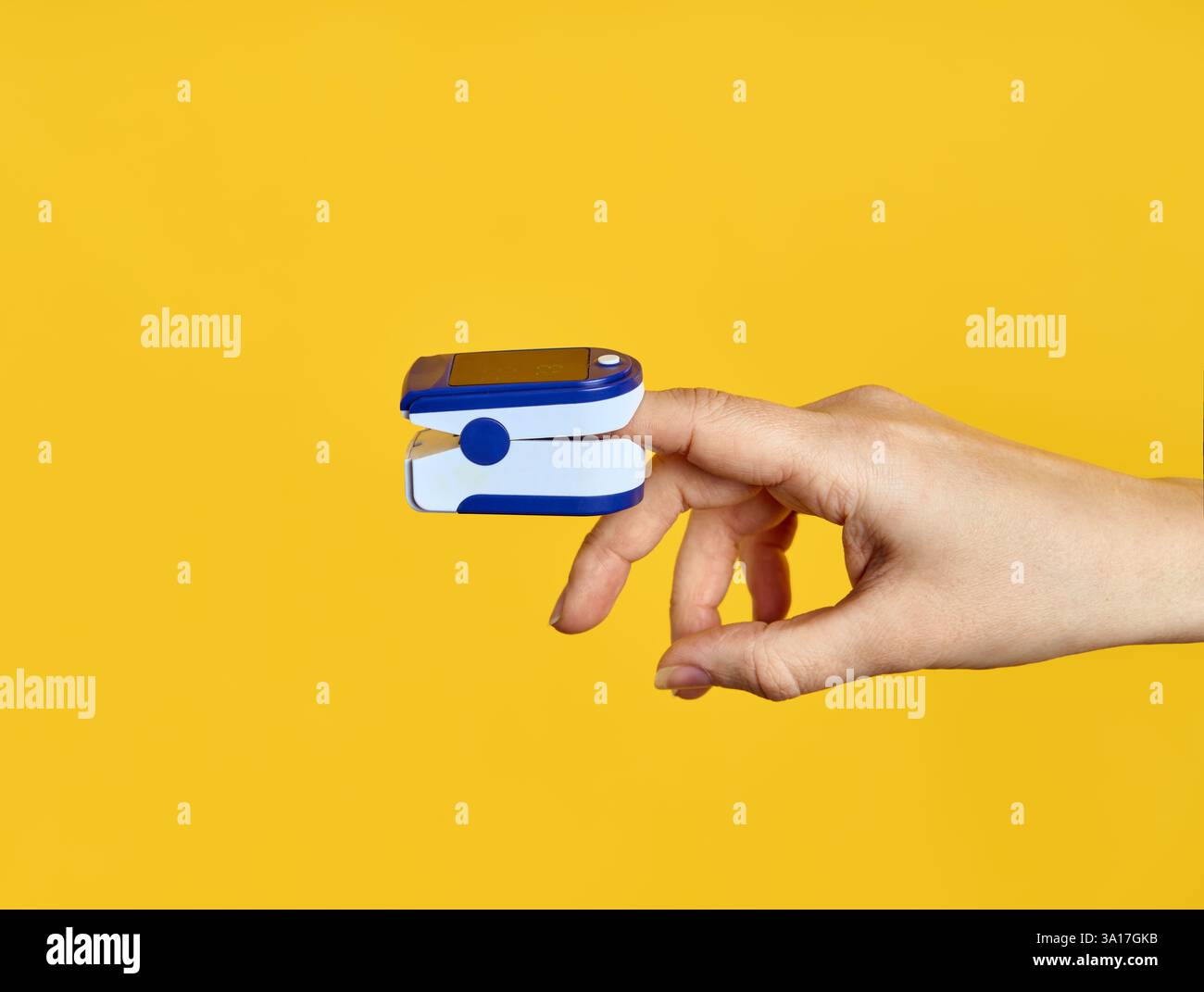 Pulse Oximeter digital device on finger measuring oxygen saturation in ...