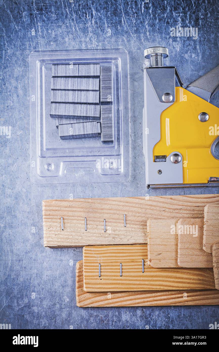 Composition of construction stapler chrome staples wooden building ...