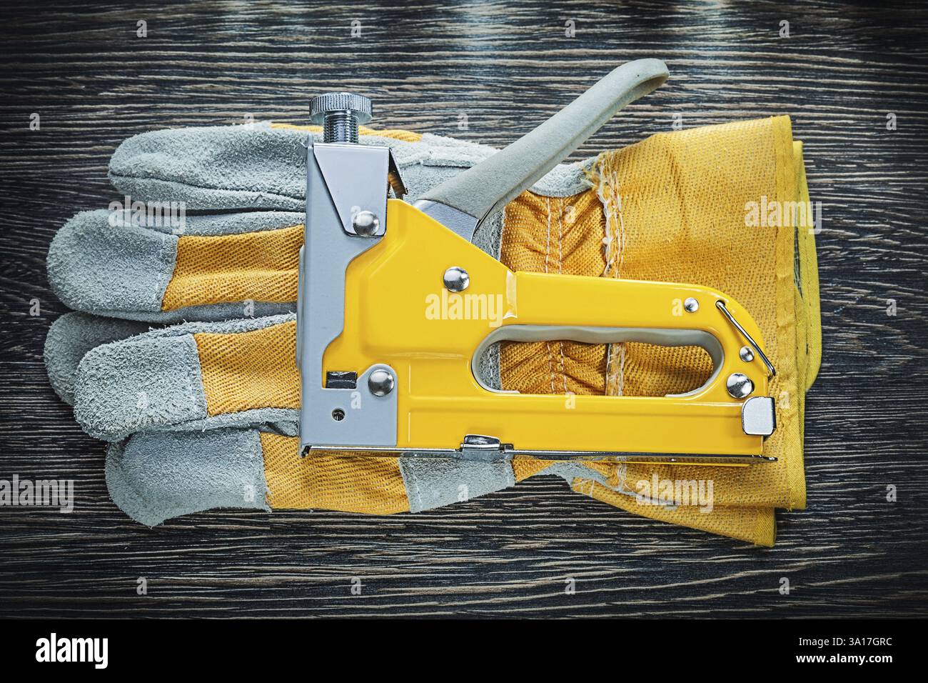 Staple gun safety gloves hi-res stock photography and images - Alamy