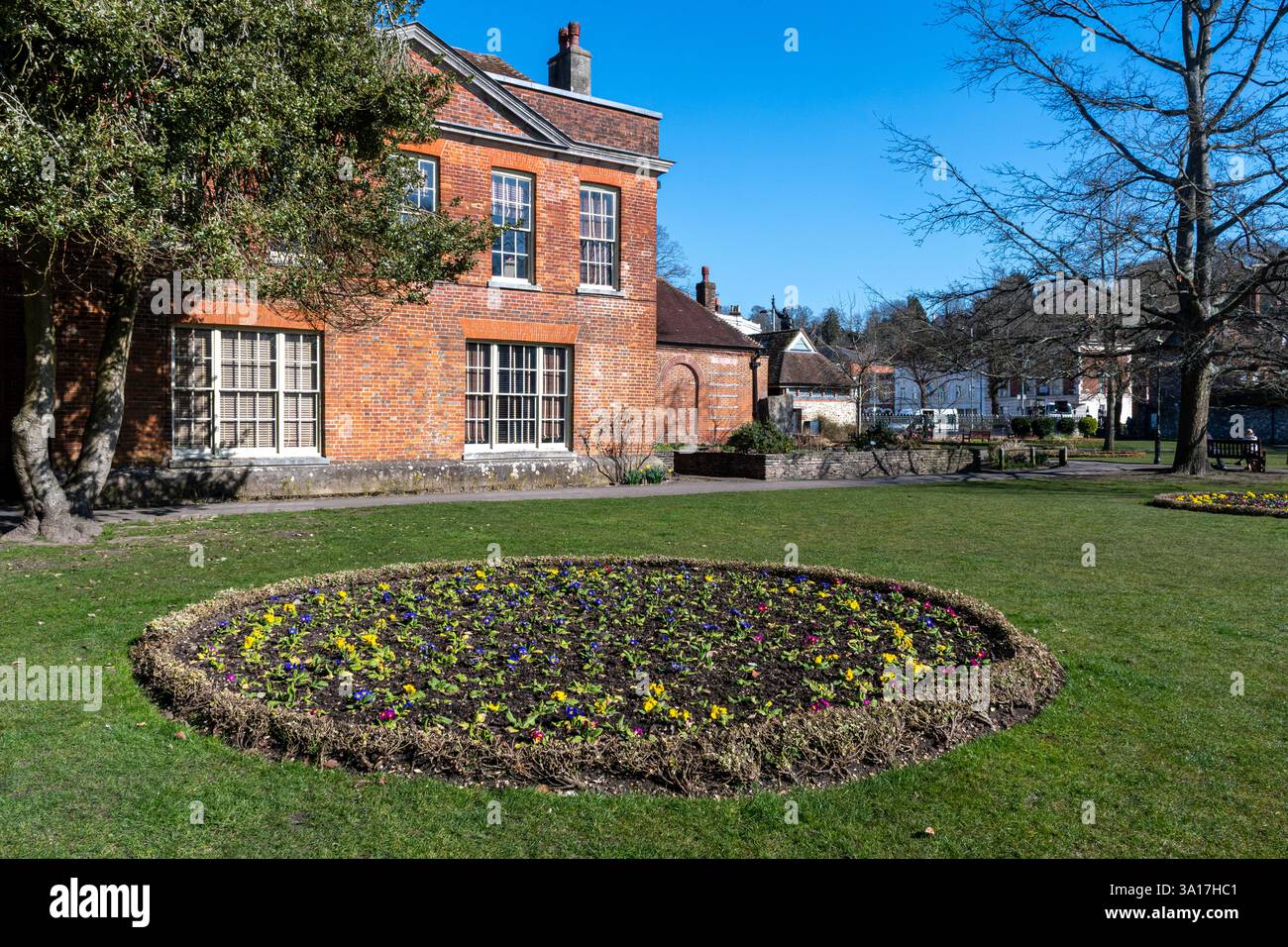 Abbey Gardens and Abbey House in Winchester with spring flowers ...
