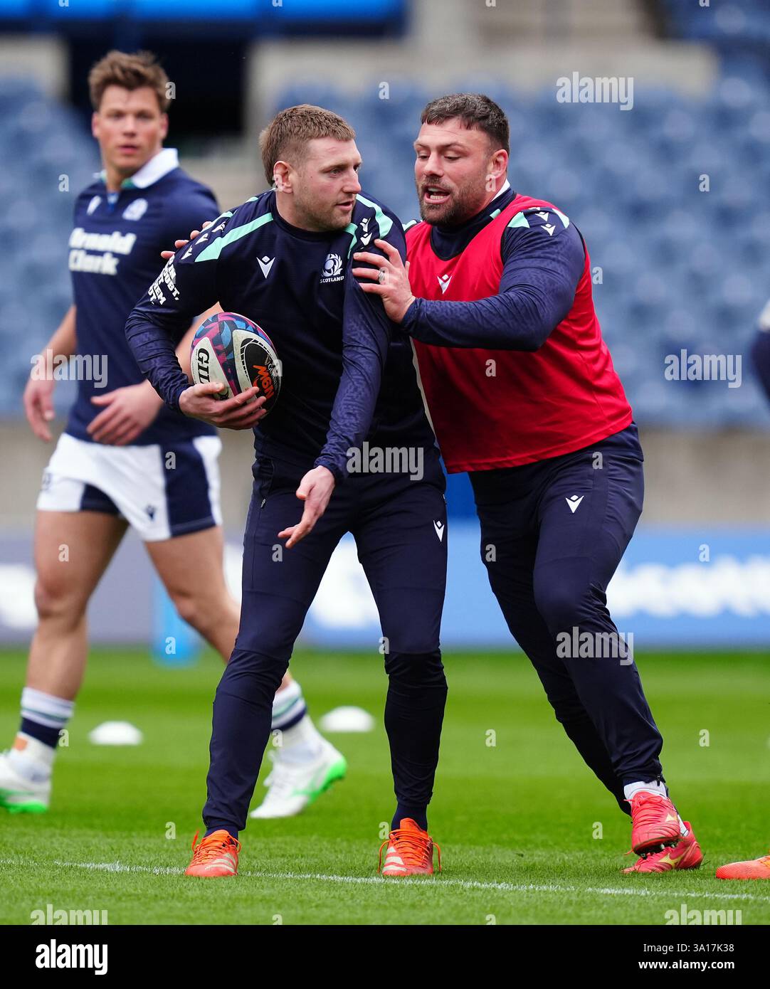 Scotland's Finn Russell (left) during a team run at Scottish Gas ...