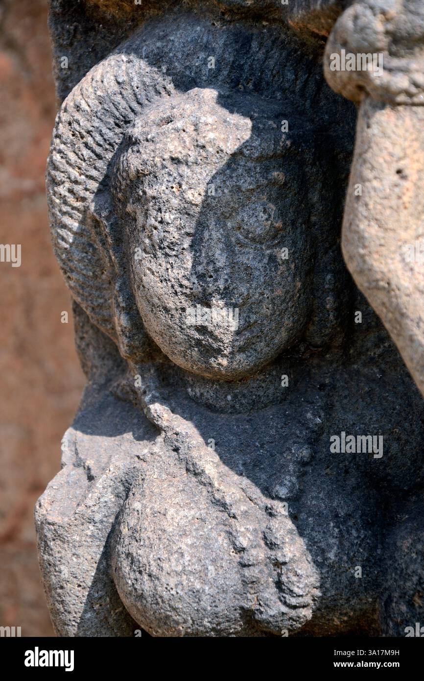 Carved stone artifacts displayed near the Solah Khamba Masjid, Fort ...