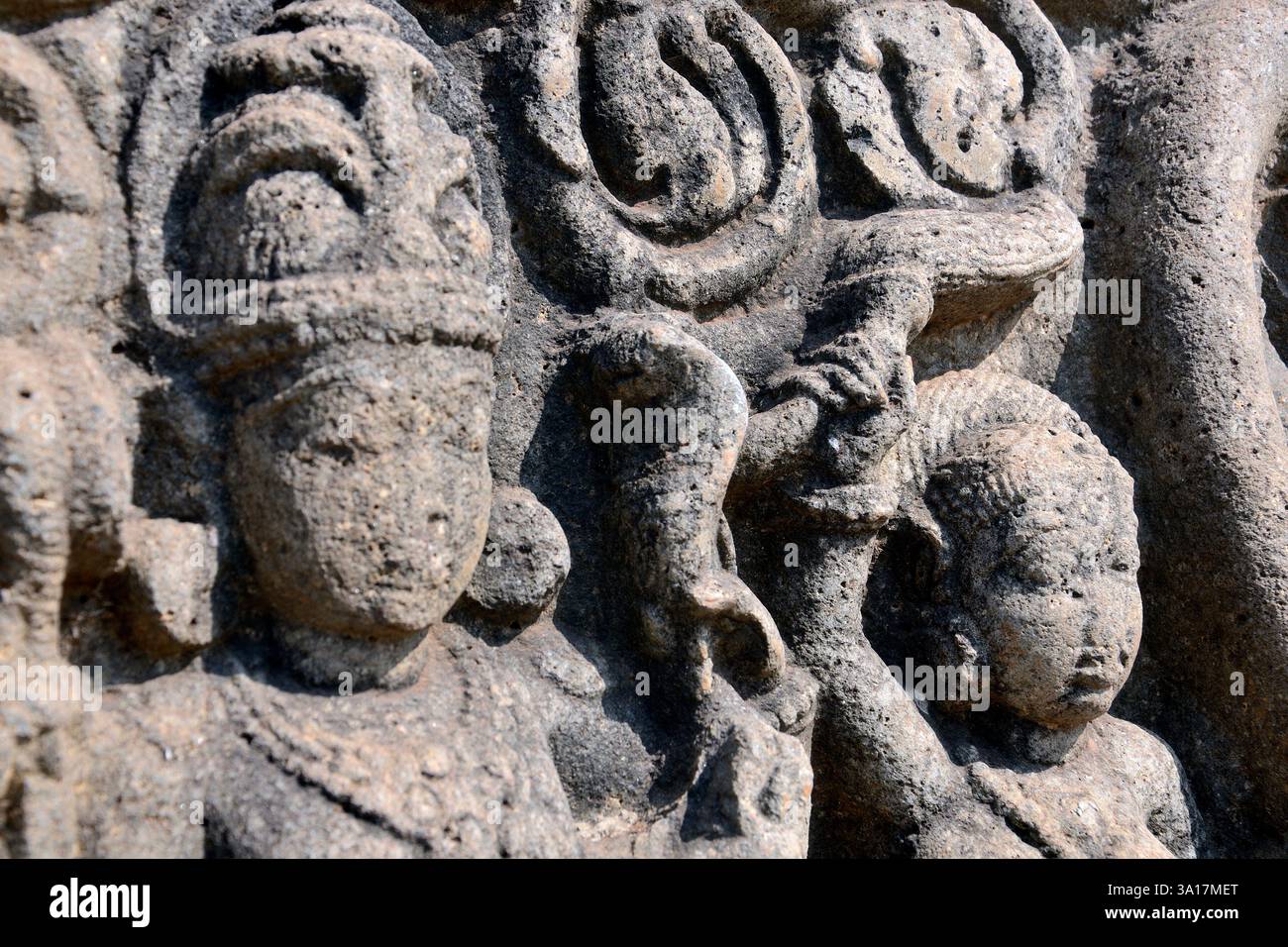 Carved stone artifacts displayed near the Solah Khamba Masjid, Fort ...
