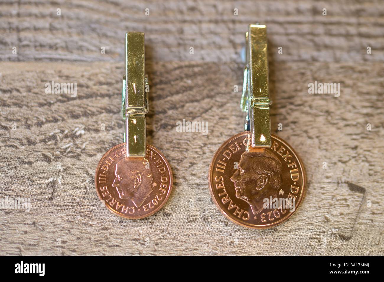 Close-Up of Two Coins, copper 1p and 2p, pennies Secured on Wooden ...
