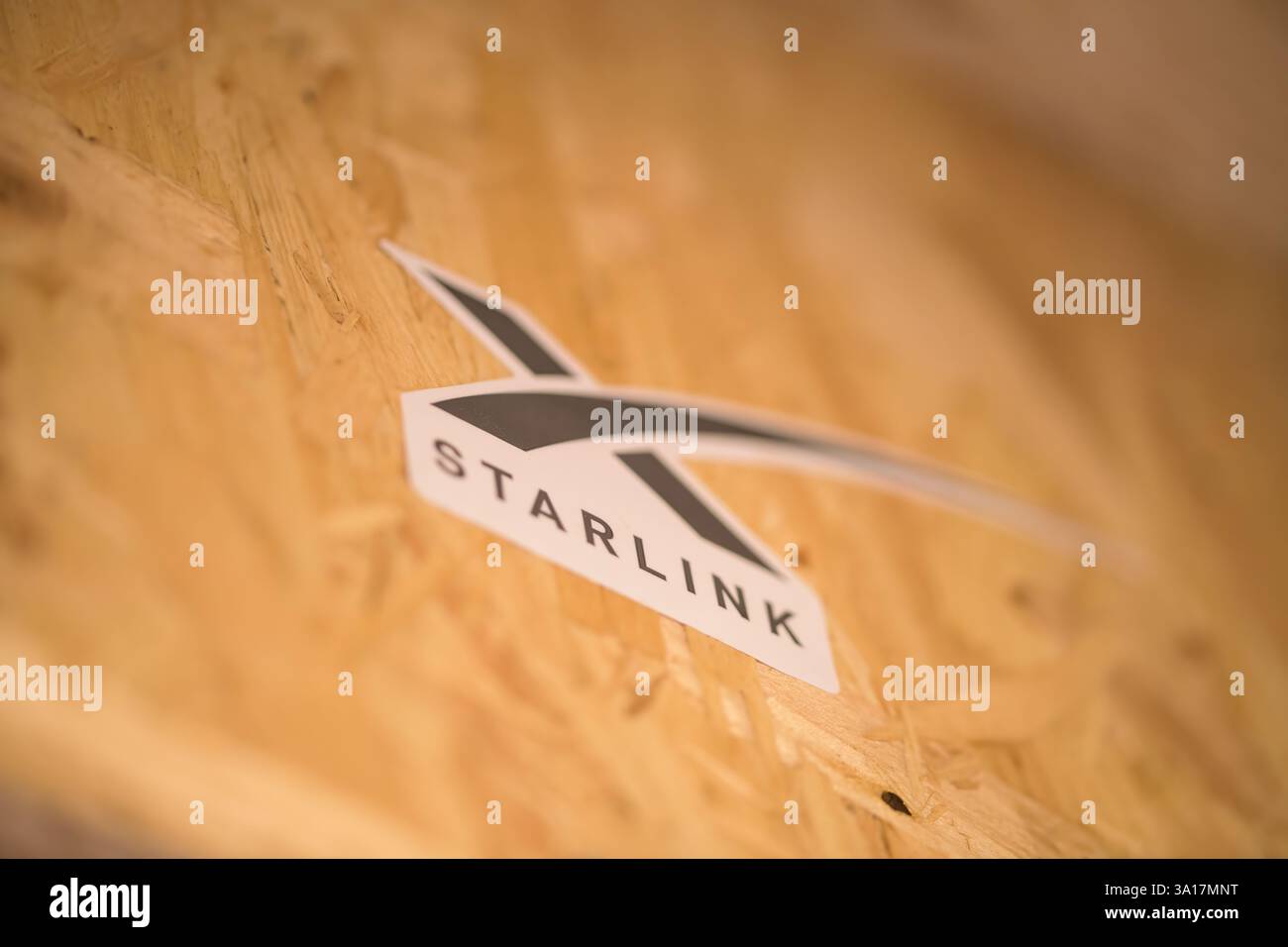Starlink Logo Displayed on Wooden, woodchip, Background with Close-Up ...