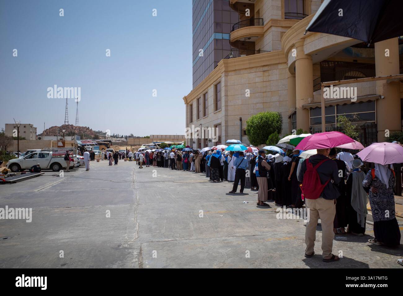 Taif City, Saudi Arabia - June 23, 2024: Hajj pilgrims queue to enjoy ...