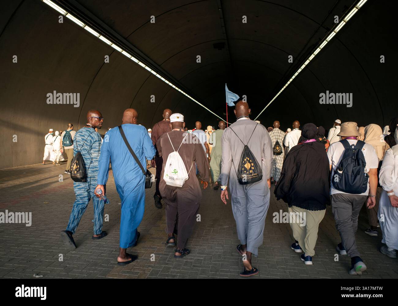 Mina, Saudi Arabia - June 18, 2024: Hajj pilgrims walking towards the ...