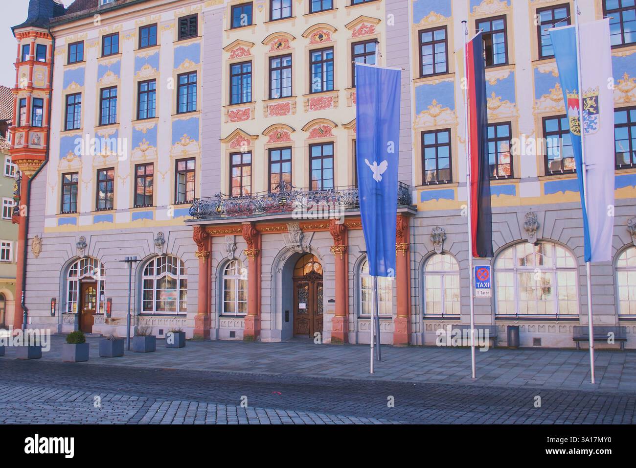This image showcases the grand entrance of the Coburg Town Hall ...