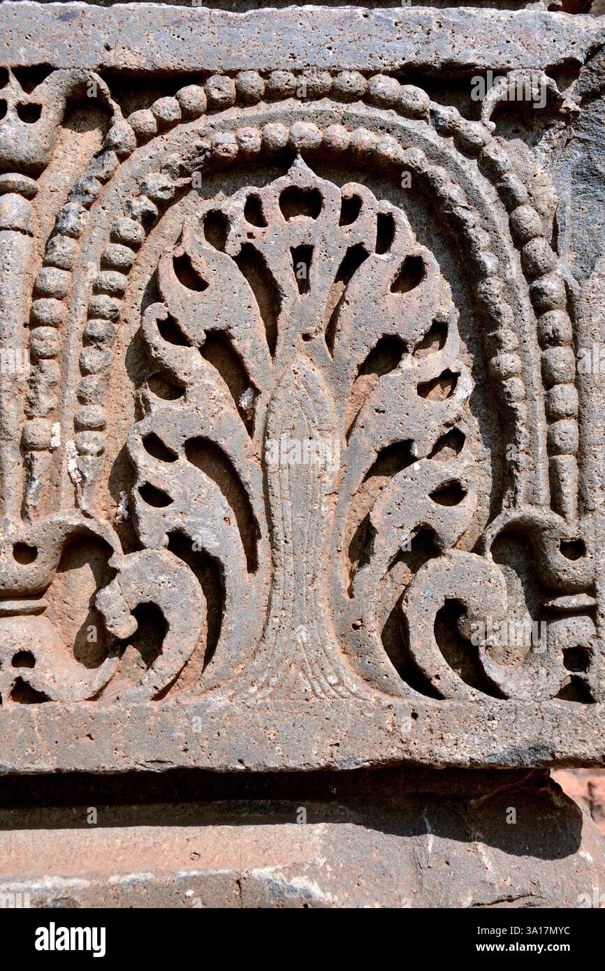 Carved stone artifacts displayed near the Solah Khamba Masjid, Fort ...