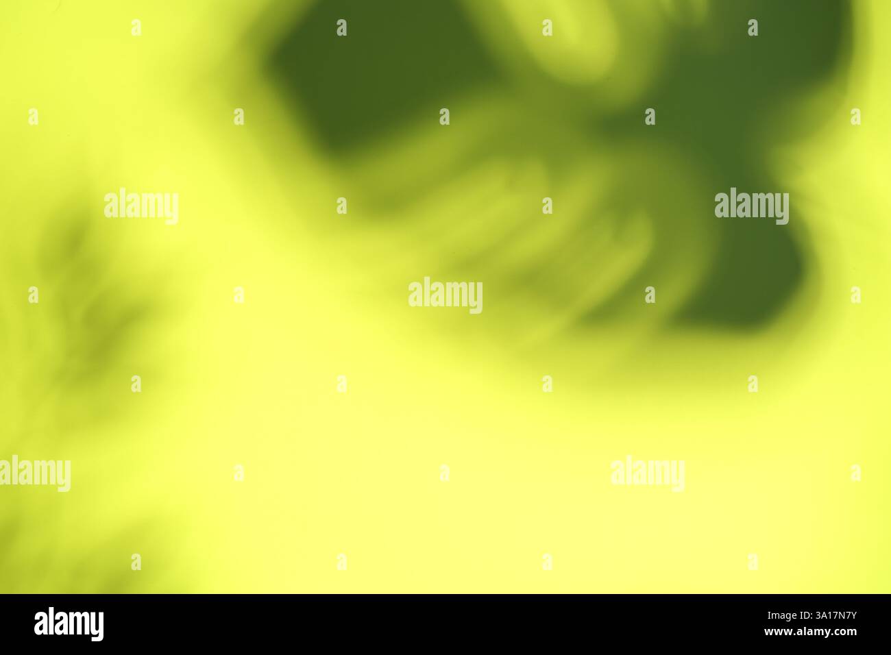 Light and shadows falling on yellow background Stock Photo - Alamy