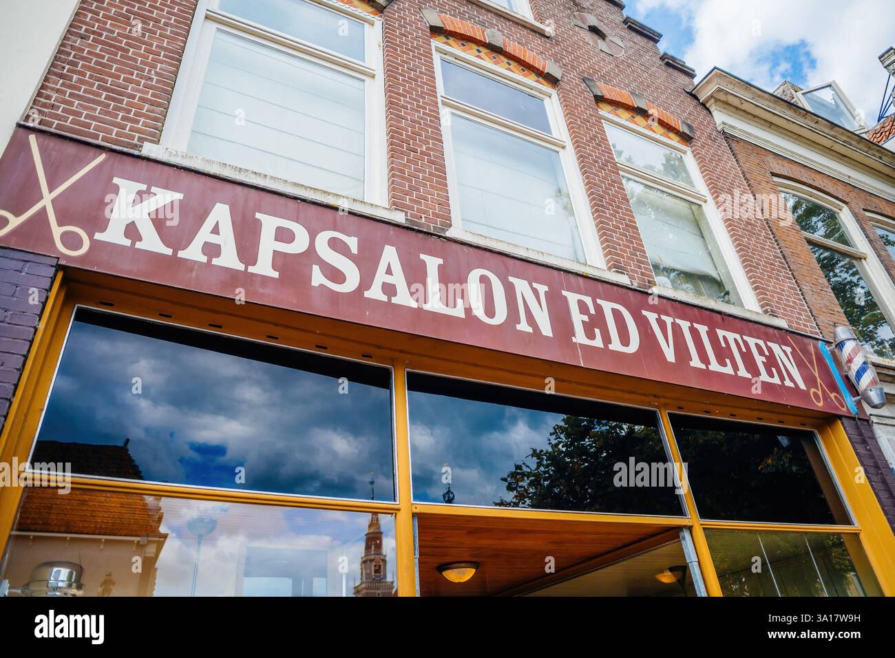 Alkmaar, Netherlands - Aug 30, 2024: Reflective storefront window of ...