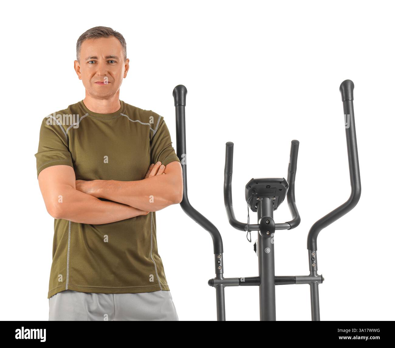 Sporty mature man with exercising bike on white background Stock Photo ...