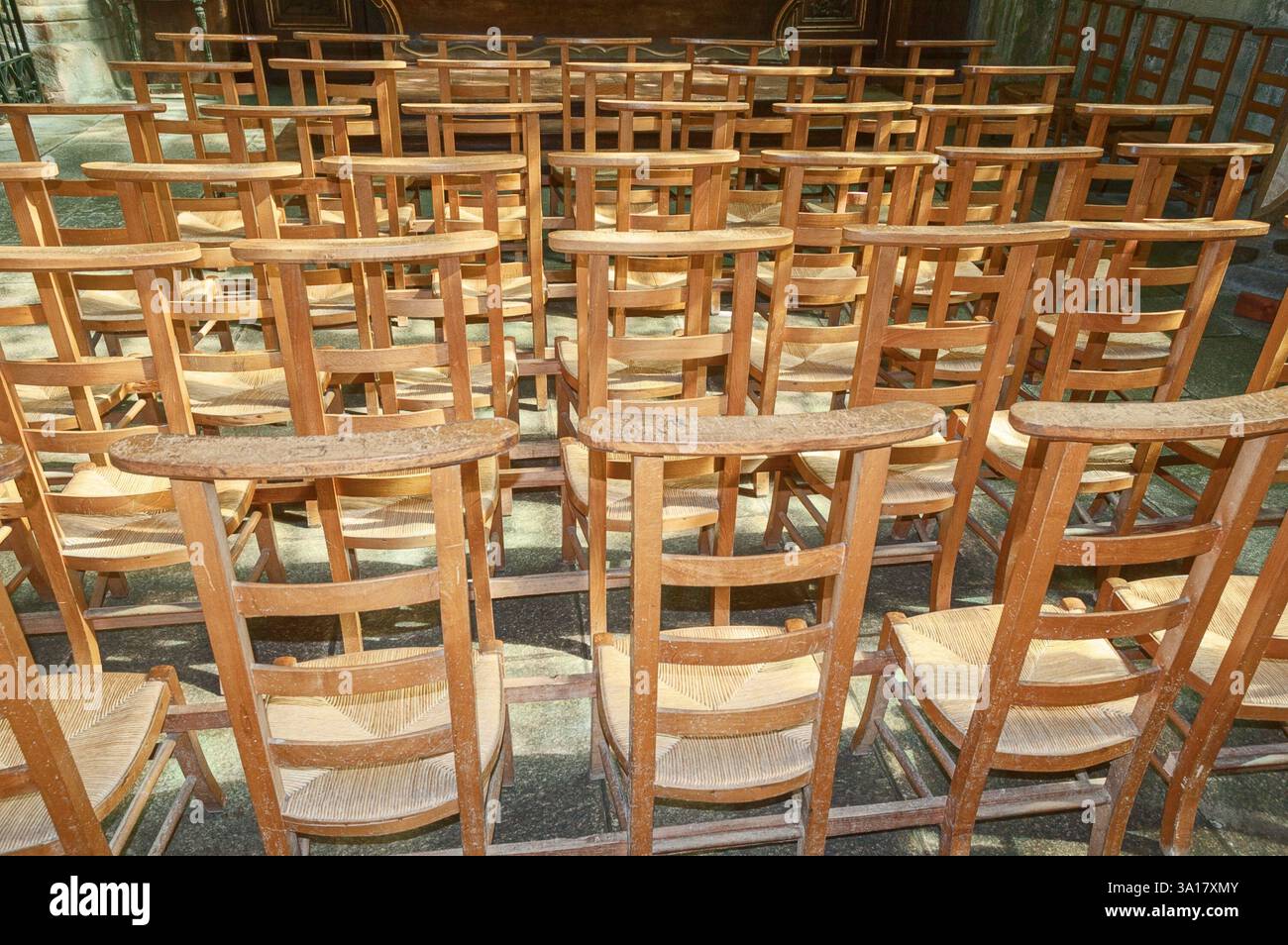 Wooden chairs set in rows in Saint Paul Aurelian Cathedral Saint-Pol-de ...