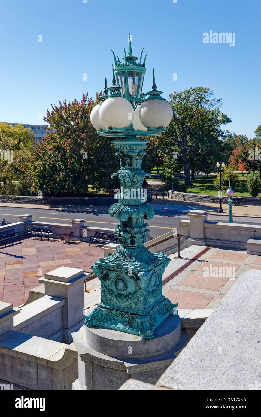 One of the four-globe lamp posts flanking the steps in front of the ...