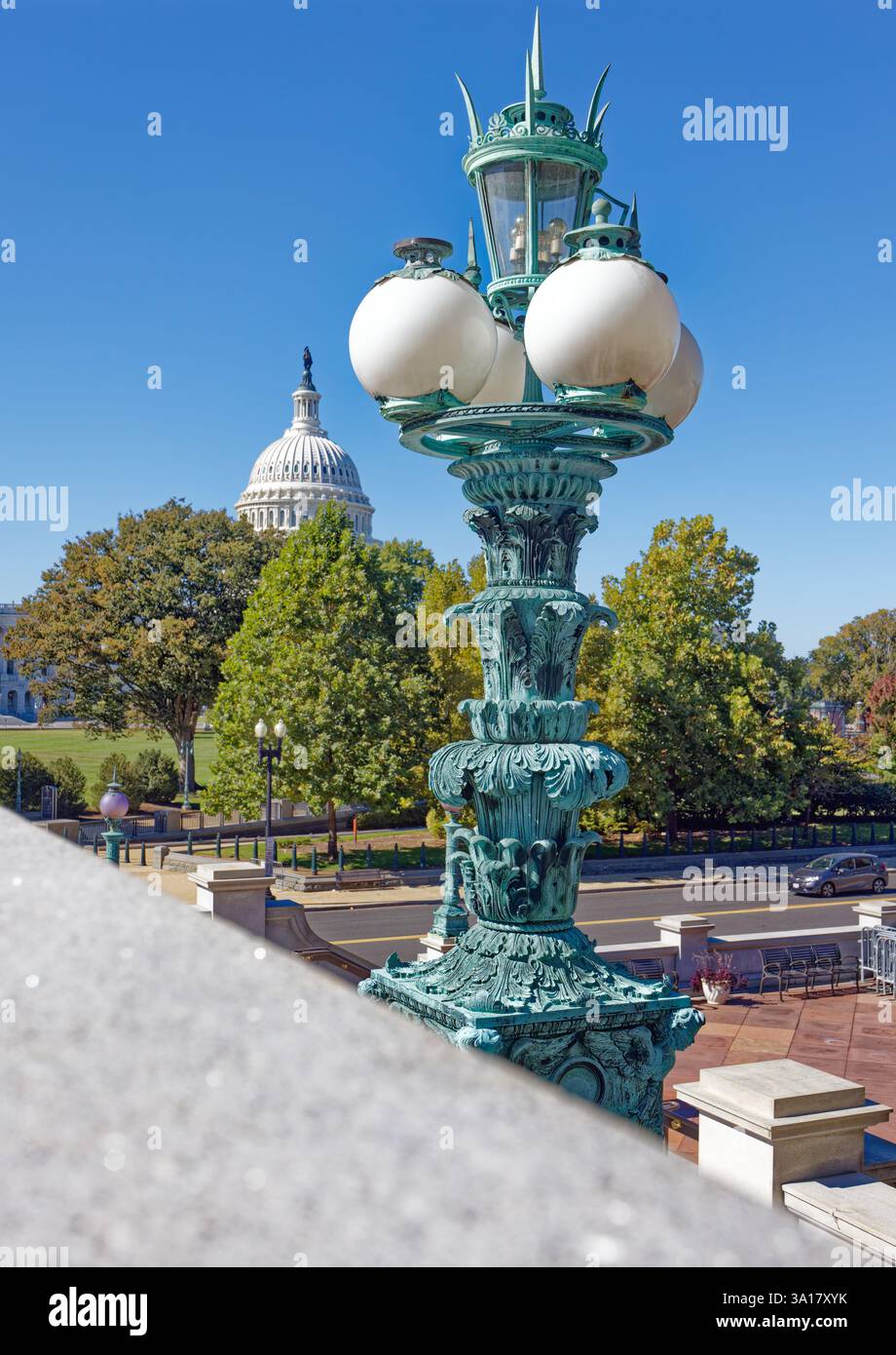 One of the four-globe lamp posts flanking the steps in front of the ...