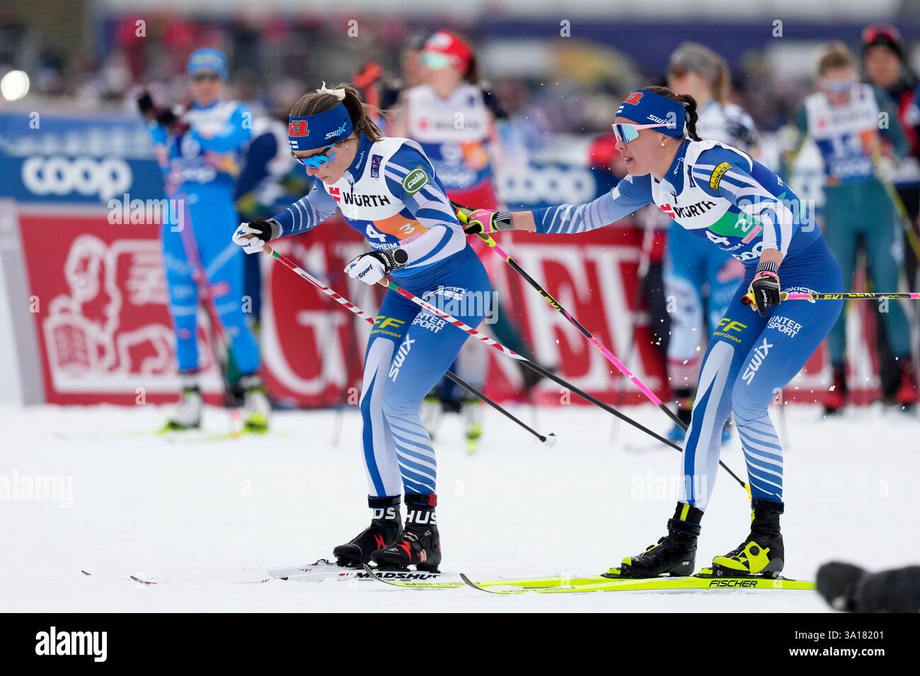 Krista Parmakoski, of Finland, takes over from teammate Kerttu Niskanen ...