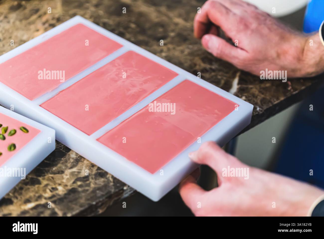Ice cream production process - inside of an hand-made ice cream parlor ...