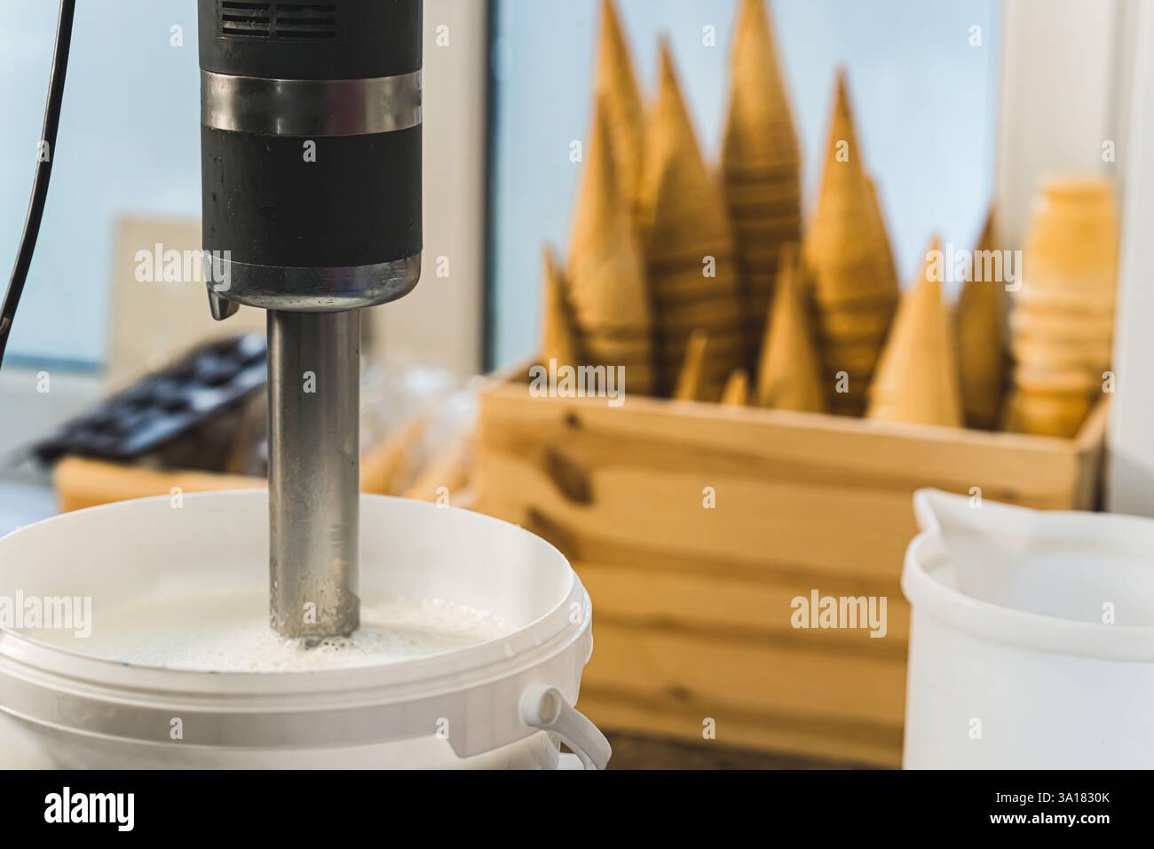 Ice cream production process - inside of an hand-made ice cream parlor ...