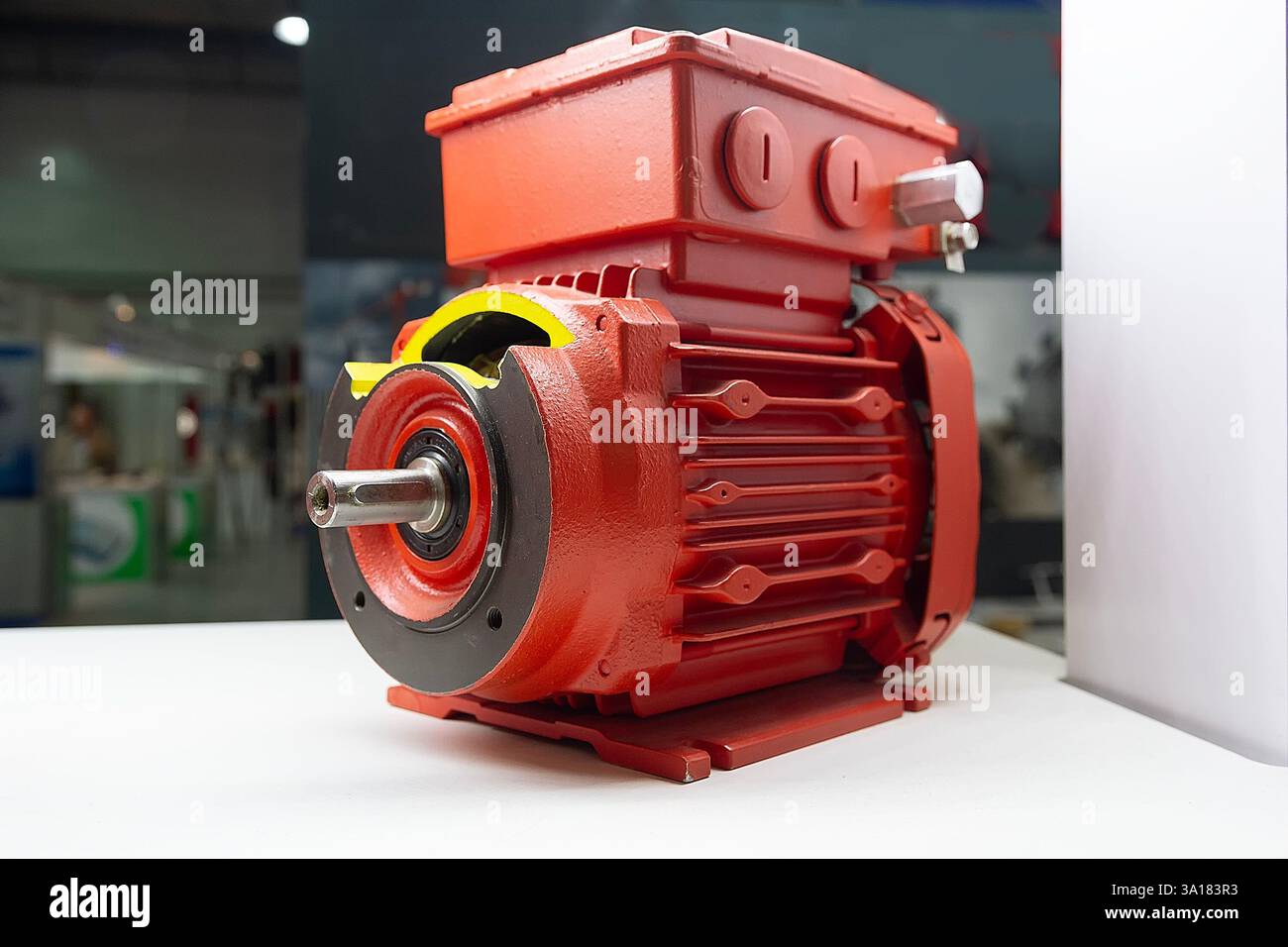 New red electric motor on the exhibition stand. Industry Stock Photo ...