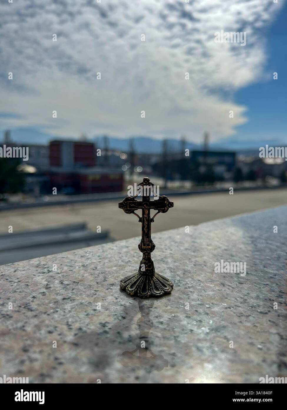 A metal Orthodox cross, crafted with care and detail, symbolizes faith ...