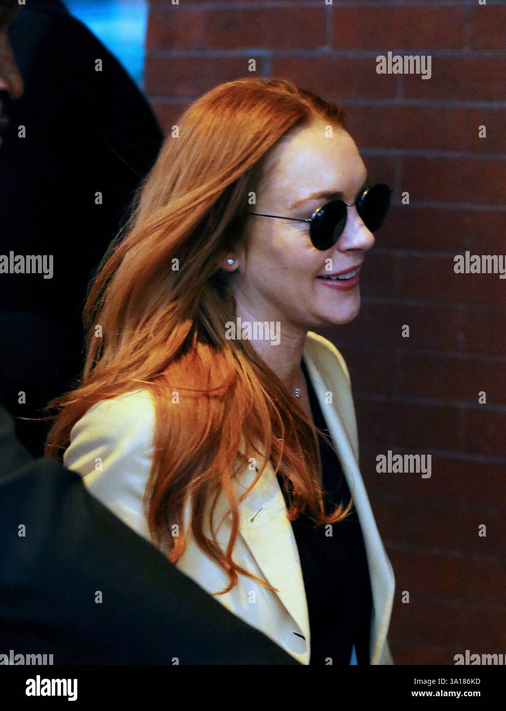 Actress Lindsay Lohan and her father Michael Lohan walk in Midtown ...