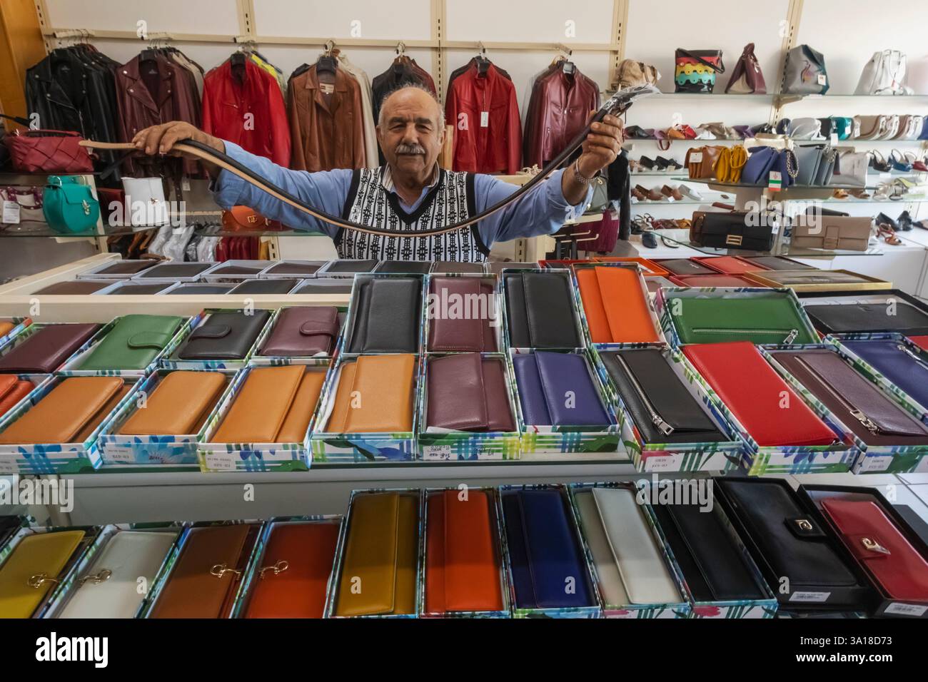 Cyprus, Paphos, Interior view of Salesman in Leatherware Shop Stock ...