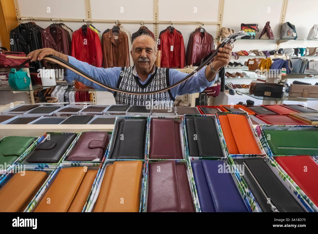 Cyprus, Paphos, Interior view of Salesman in Leatherware Shop Stock ...
