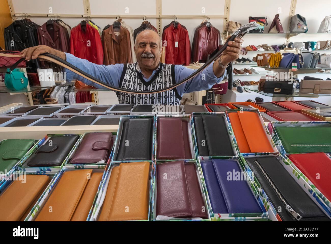 Cyprus, Paphos, Interior view of Salesman in Leatherware Shop Stock ...