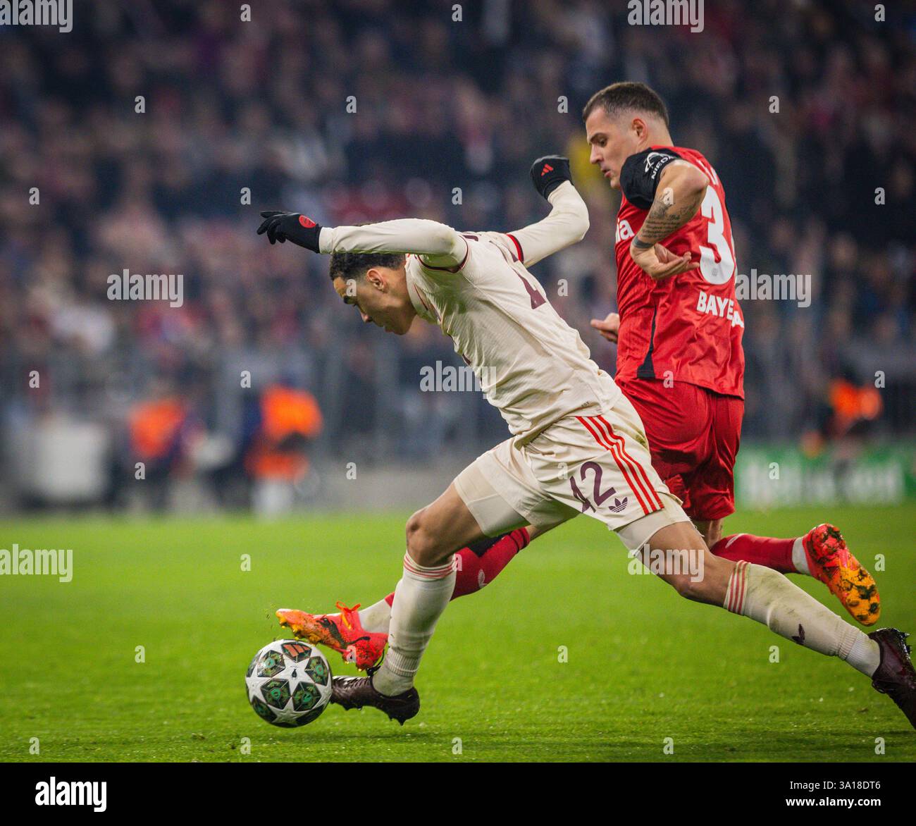 Munich, Germany. 05th Mar 2025. Jamal Musiala (FCB) Granit Xhaka (LEV) FC Bayern München - Bayer ...