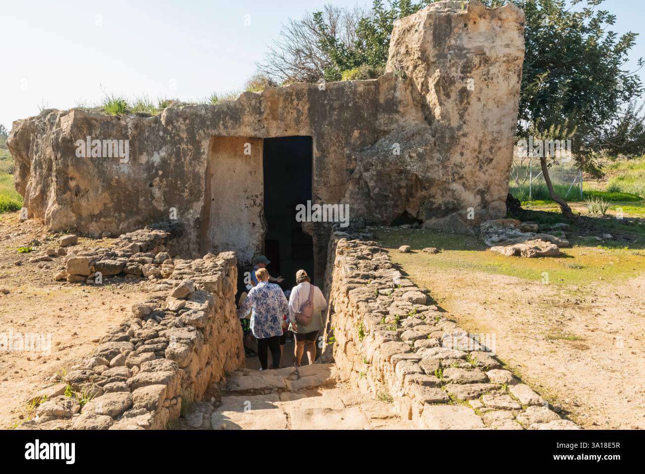 Cyprus, Paphos, Tombs of the Kings, Tourists Entering Chamber Tomb ...