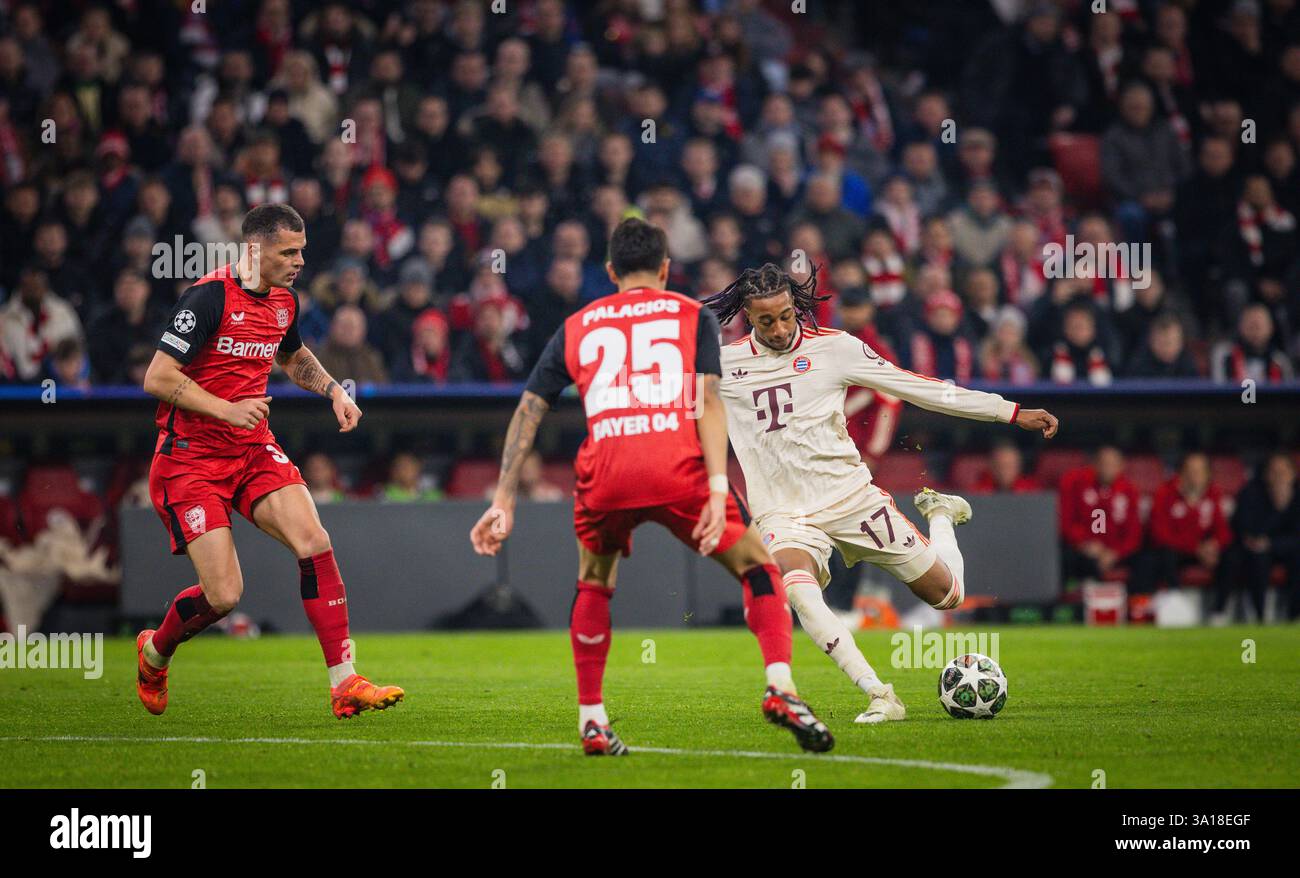 Munich, Germany. 05th Mar 2025. Michael Olise (FCB) Exequiel Palacios (LEV) Granit Xhaka (LEV ...