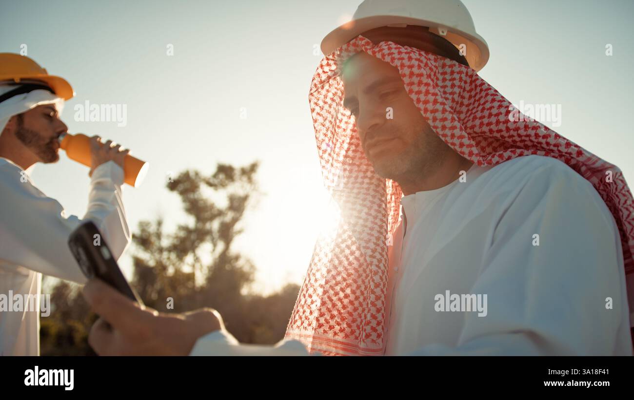 Hot And Busy Day At The Worksite Stock Photo - Alamy